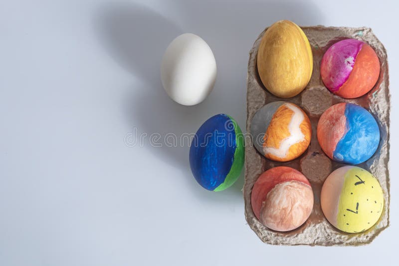 Colorful Decorated Easter Eggs in a Cardboard Box on a White Background ...