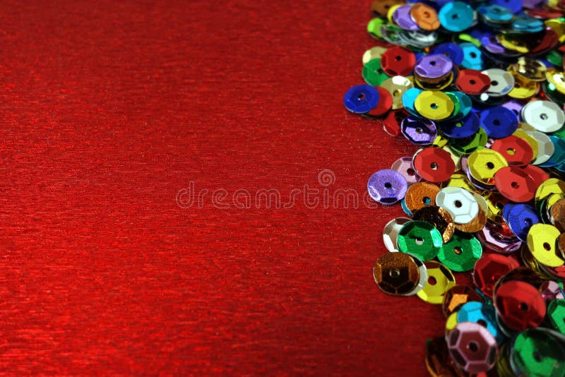 Colorful Decorations on Shiny Red Decorative Paper Stock Photo - Image ...