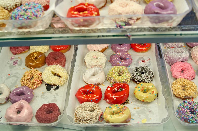 Colorful Delicious Donuts on the Counter Stock Image - Image of vibrant ...