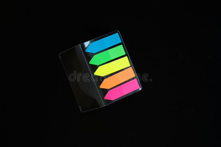 Colorful Diagonal Sticky Note Flags on Black Background Stock Image ...