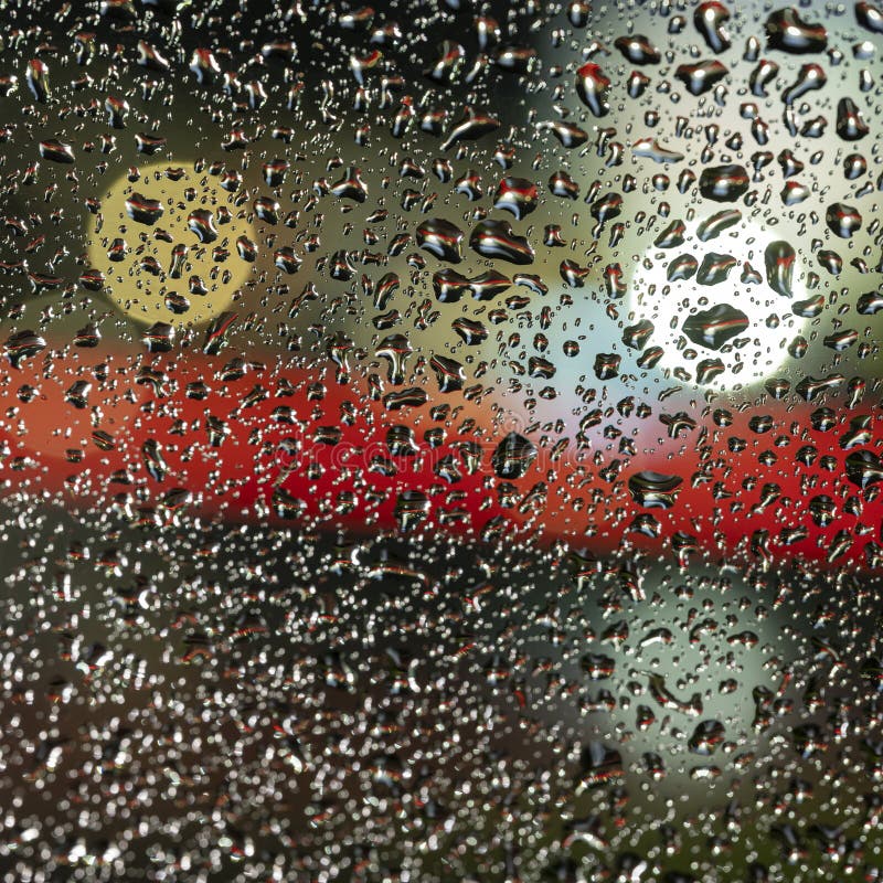 Colorful Diffuse Unsharp Lights Behind Glass Window with Rain Drops ...