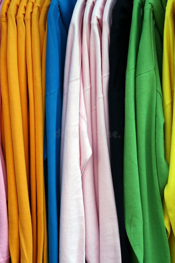 Colorful Display on Shirts Hanging on a Rack Stock Photo - Image of ...