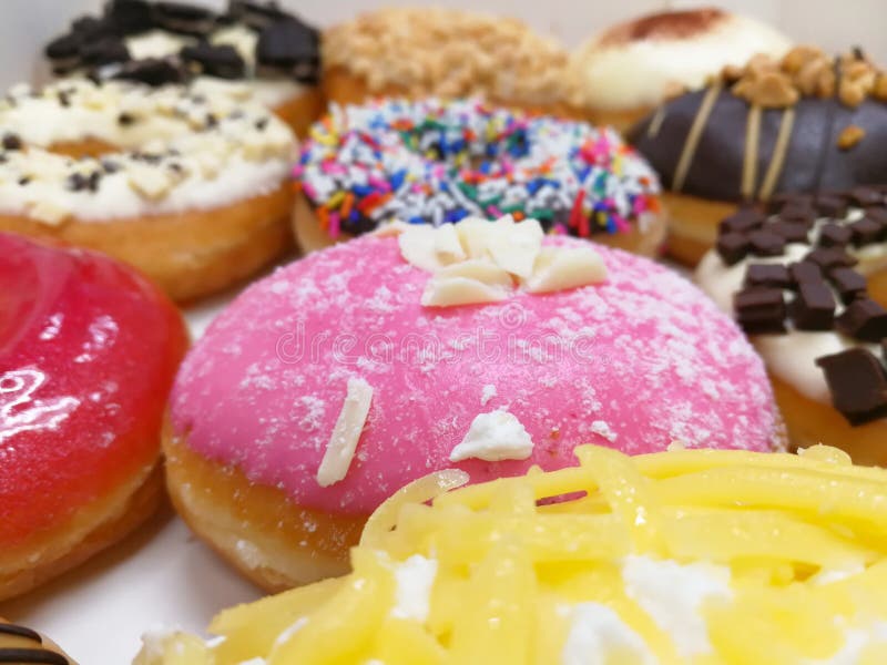 Colorful of doughnuts stock image. Image of frosting - 101144633