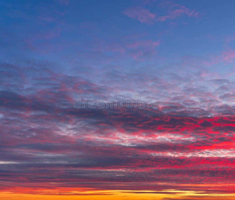 Colorful Dramatic Clouds Lit by a Sun Against the Sunset or Sunrise ...