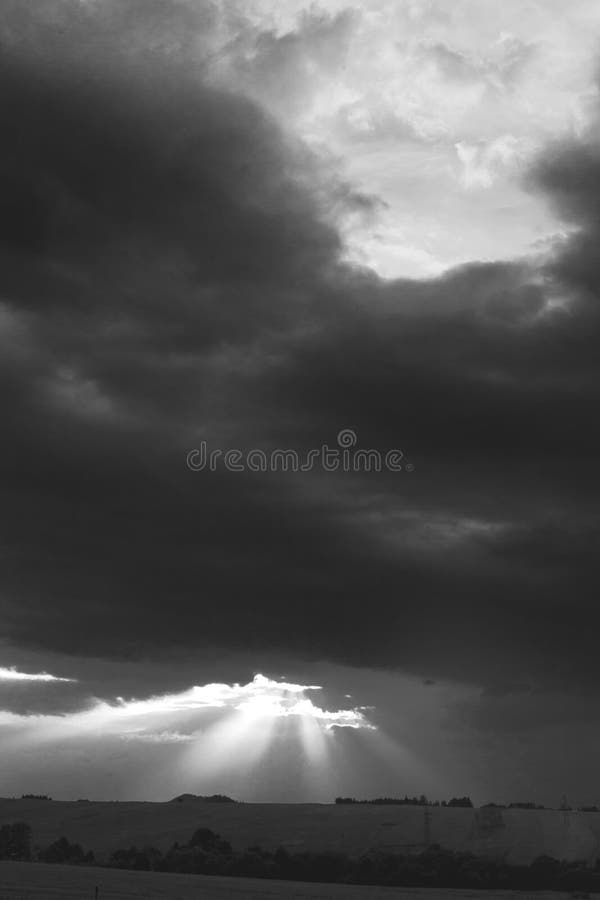 Colorful Dramatic Sky with Sunbeams and Heavy Clouds at Sunset Stock ...