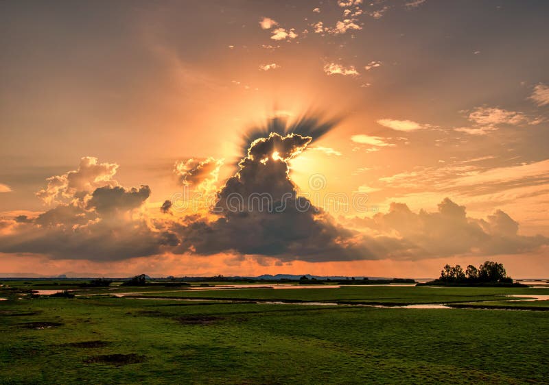 Colorful Dramatic Sky with Sunlight and Cloud at Sunset on Grass Field ...