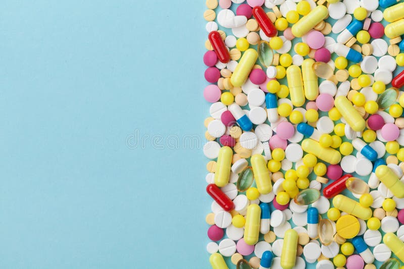Colorful Drug Pills on Blue Background, Pharmaceutical Concept Stock ...