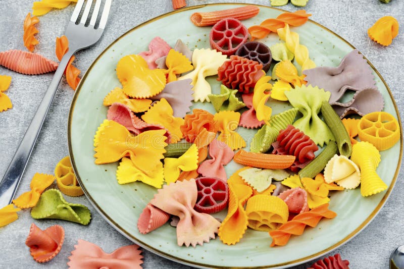 Colorful dry pasta stock photo. Image of macaroni, diet - 265672614
