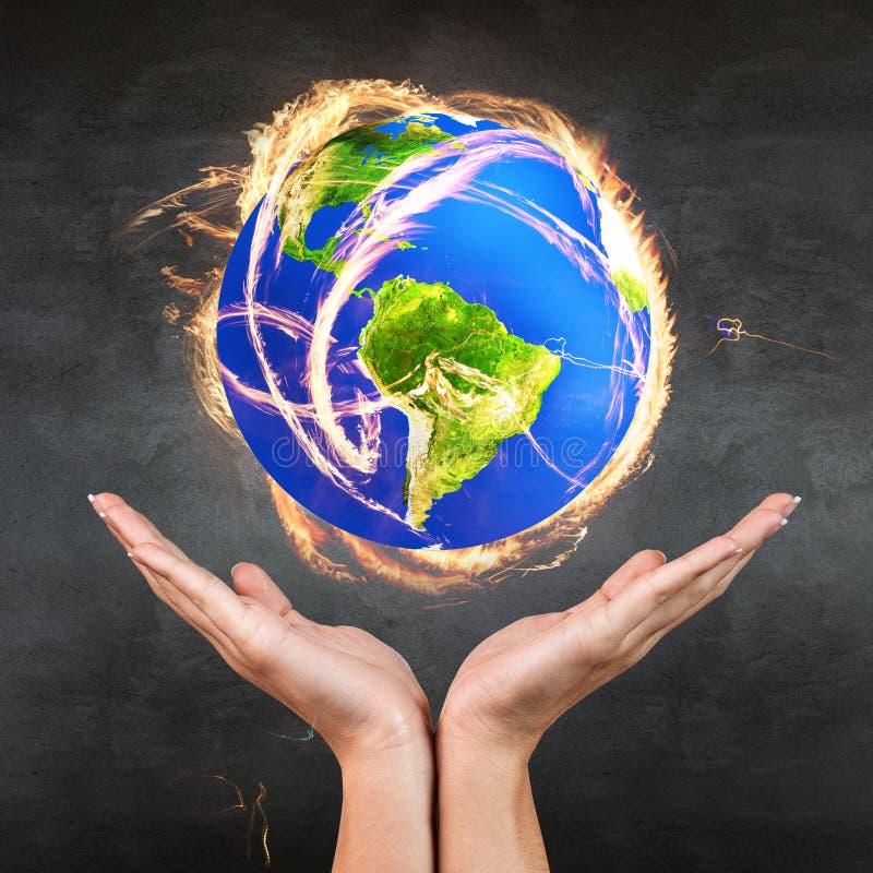 Colorful earth in fire stock image. Image of global, holds - 66002737