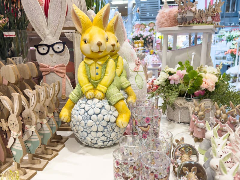 Colorful Easter Display with Bunny Figurines and Spring Decorations ...