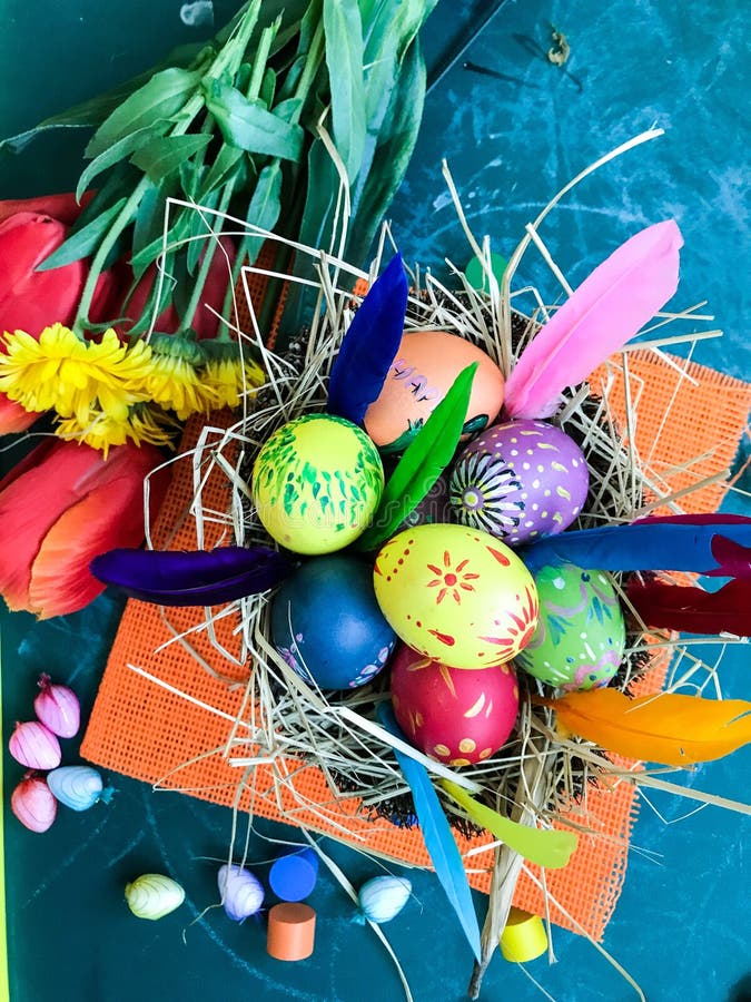 Colorful Easter Egg and Blue Background and Small Wooden House Stock ...