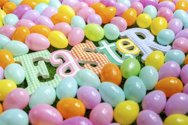 Colorful Easter Eggs and Easter Banner Letters on Artificial Grass ...