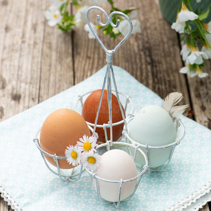 Colorful Easter Eggs in a Small Metal Egg Basket Stock Photo - Image of ...