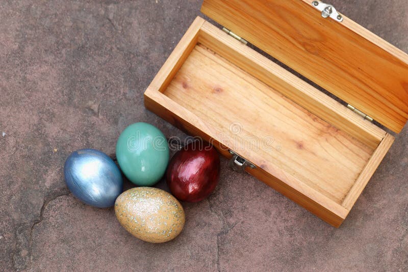 Colorful Easter Eggs and Wooden Box on Stone Floor Stock Photo - Image ...