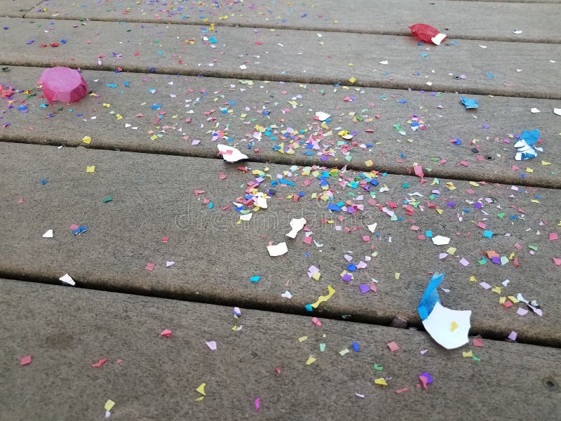 Colorful Egg Shells and Paper Confetti on Wood Deck Stock Image - Image ...