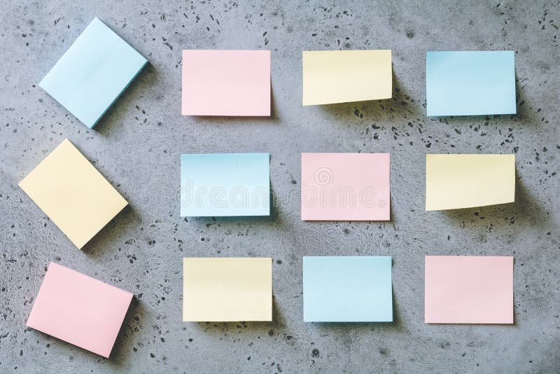 Colorful Empty Sticky Notes on a Grey Textured Background Stock Photo ...