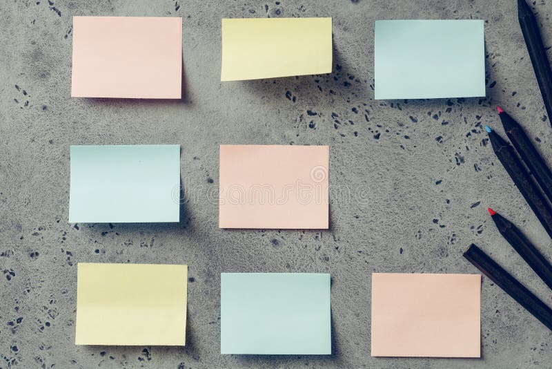 Colorful Empty Sticky Notes on a Grey Textured Background Stock Photo ...