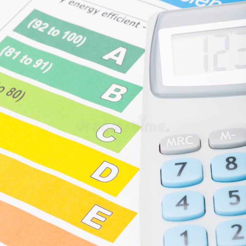 Colorful Energy Efficiency Chart and Calculator Over it - Close Up Shot ...
