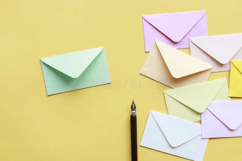 Colorful Envelopes on Yellow Background Stock Photo - Image of ...