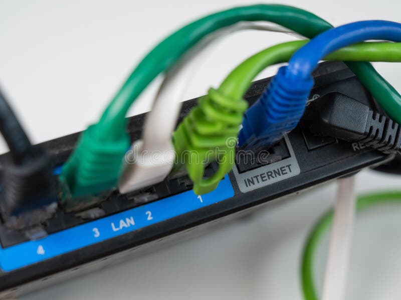Colorful Ethernet Cables Connected To a Router. Stock Image - Image of ...