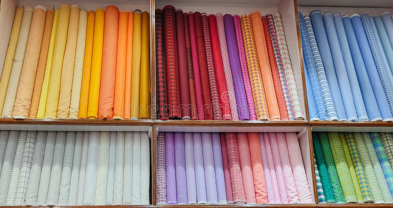 Colorful Fabric Rolls in a Shop Stock Image - Image of text, oranges ...
