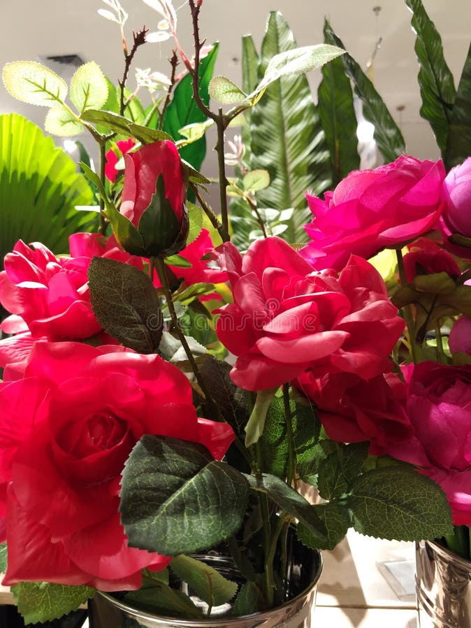 COLORFUL COLORFUL FAKE FLOWERS at a SHOPPING Stock Photo - Image of ...