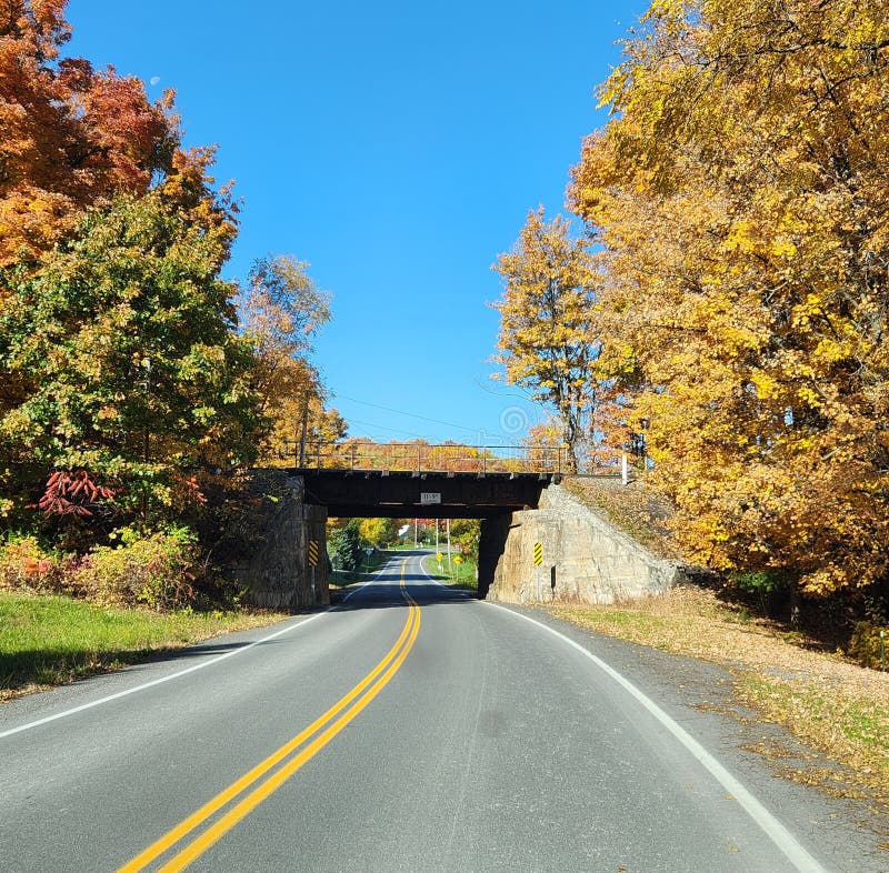 Colorful Fall Railroad Crossing Bridge Stock Photo - Image of bridge ...