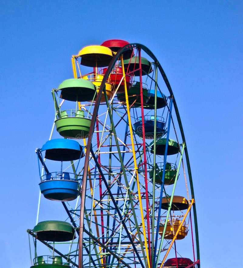 Colorful Ferris wheel stock photo. Image of cabin, diversion - 21480544