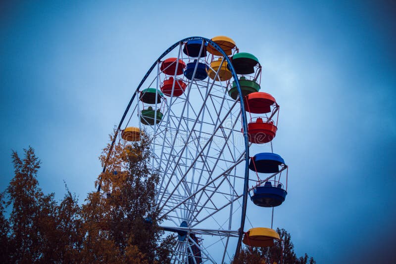 Colored Ferris Wheel and Cloudy Sky Stock Image - Image of cloudy, open ...