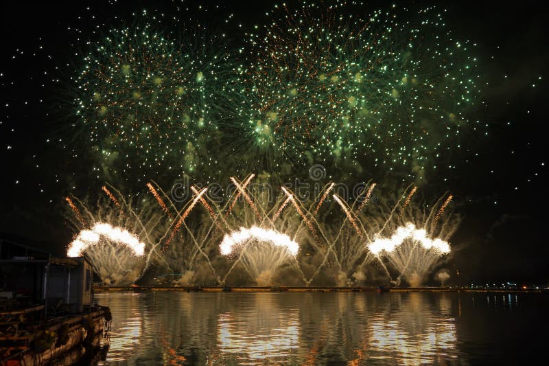 A Colorful Fire Works during a Celebration in the River with Beautiful ...
