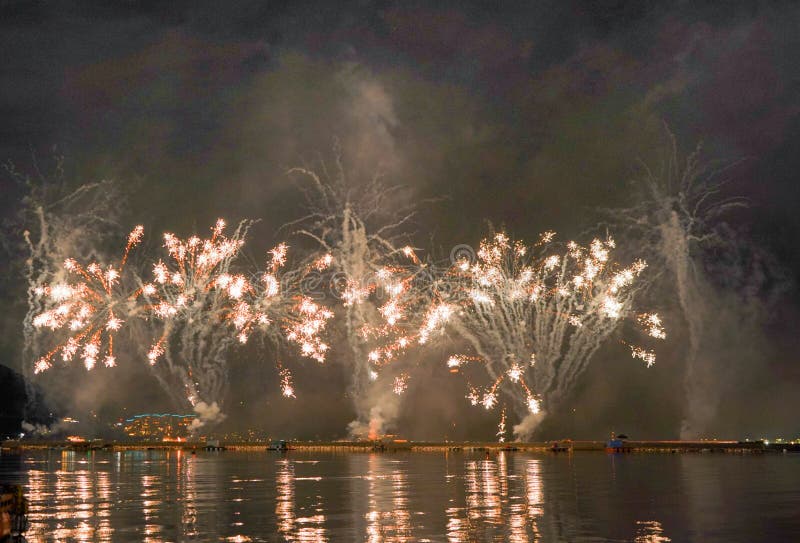 A Colorful Fire Works during a Celebration in the River with Beautiful ...