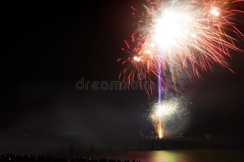 Colorful Firework Popping and Lighting Up the Dark Sky Stock Image ...