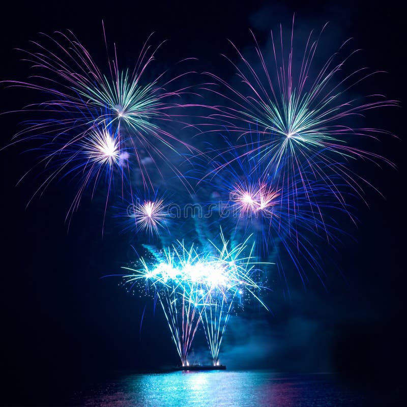 Fireworks over water stock photo. Image of events, celebrate - 38147376