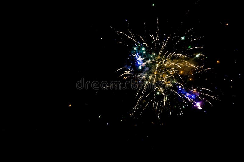 Colorful Fireworks Exploding Against a Dark Night Sky Stock Photo ...