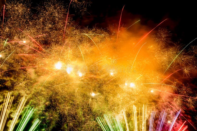 Fireworks Exploding Over the Ocean at Night Stock Photo - Image of ...