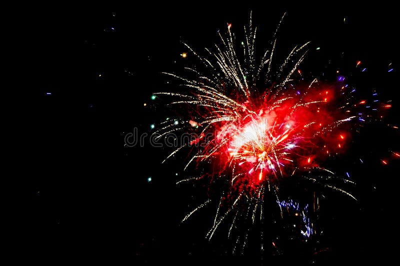 Colorful Fireworks Exploding Against a Dark Night Sky Stock Photo ...