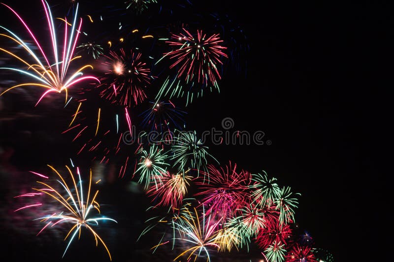 Colorful Fireworks Exploding in a Dark Night Sky-celebration and Light ...