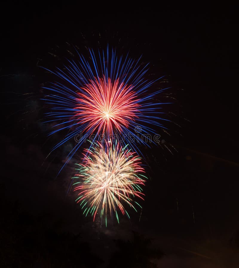 Colorful Fireworks Exploding in the Night Sky Stock Photo - Image of ...
