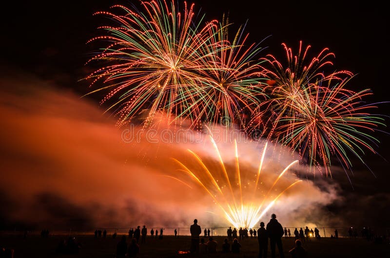 Colorful Fireworks Over Night Sky Stock Image - Image of spectators ...