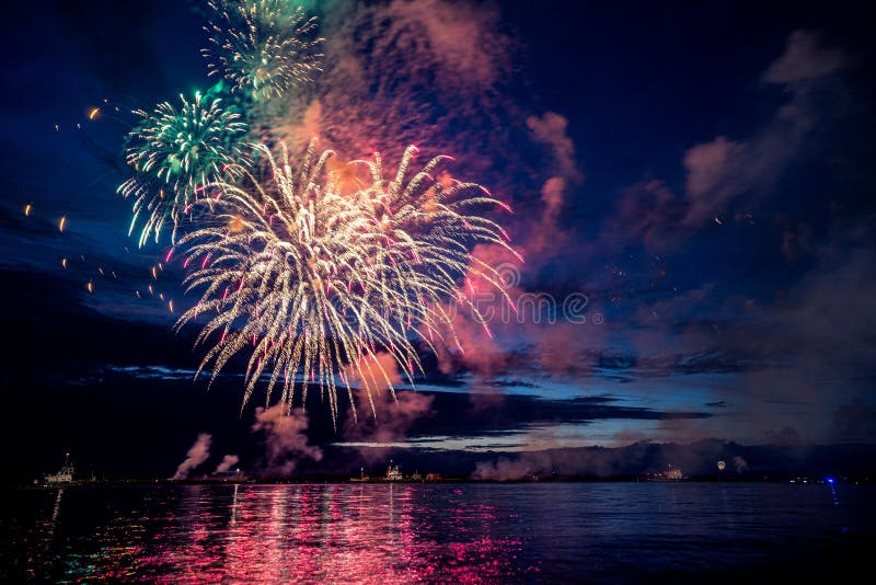 Colorful Fireworks Reflect from Water, Beautiful Scenery Stock Image ...