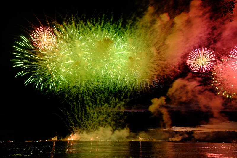 Colorful Fireworks Reflect from Water, Beautiful Scenery Stock Photo ...