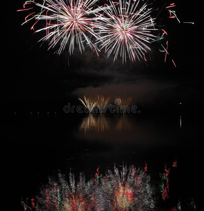 Colorful Fireworks with Reflection on Lake. Stock Image - Image of ...