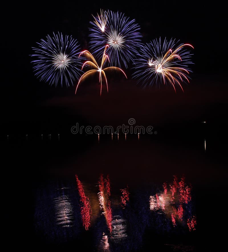 Colorful Fireworks with Reflection on Lake. Stock Photo - Image of ...
