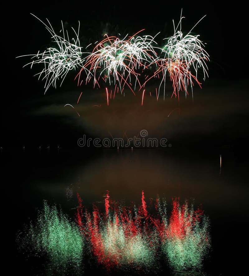 Colorful Fireworks with Reflection on Lake. Stock Photo - Image of ...