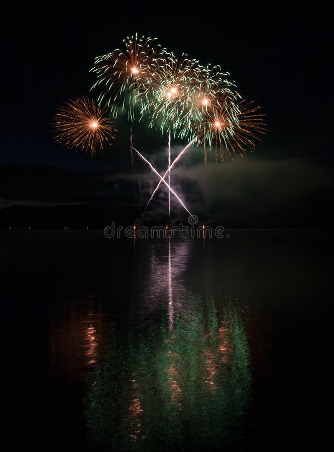Colorful Fireworks with Reflection on Lake. Stock Photo - Image of dark ...