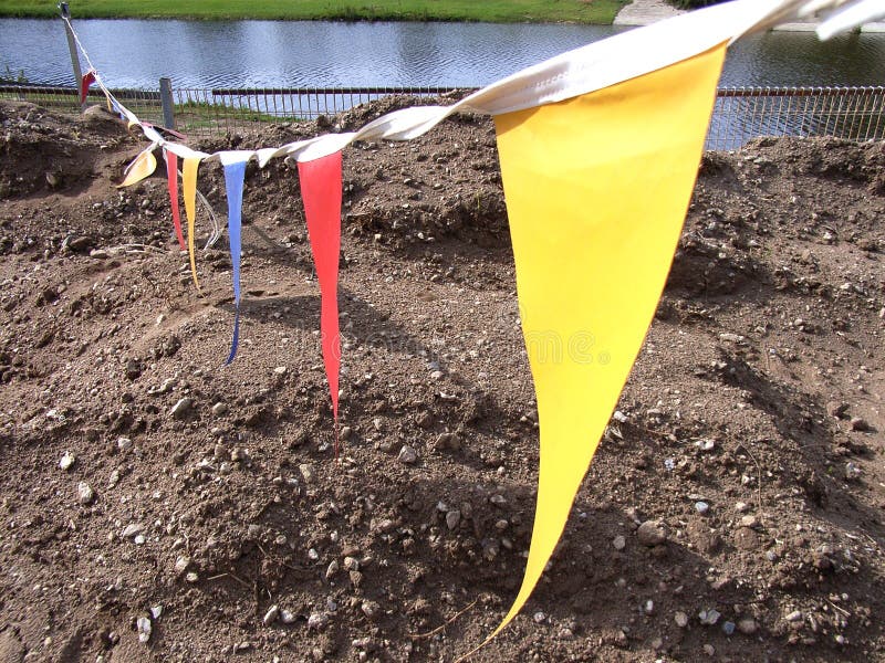 Colorful Flags & Dirt stock photo. Image of yellow - 3502236