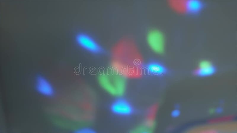 Colorful Flashing Lights on the Wall. Sliding in Depth of Sharpness and ...