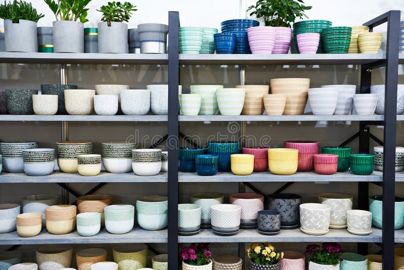 Colorful Flower Pots on Shelf in Store Stock Photo - Image of colored ...