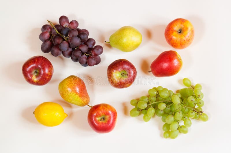 Colorful Food Pattern Made of Apples, Pears, Lemon and Grape Stock ...