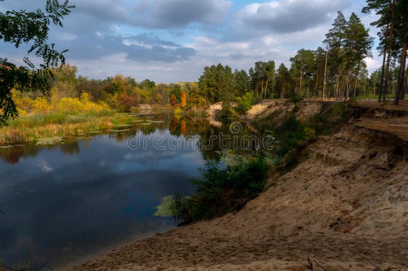 Colorful Forest Landscape with a Cliff by the River Stock Image - Image ...